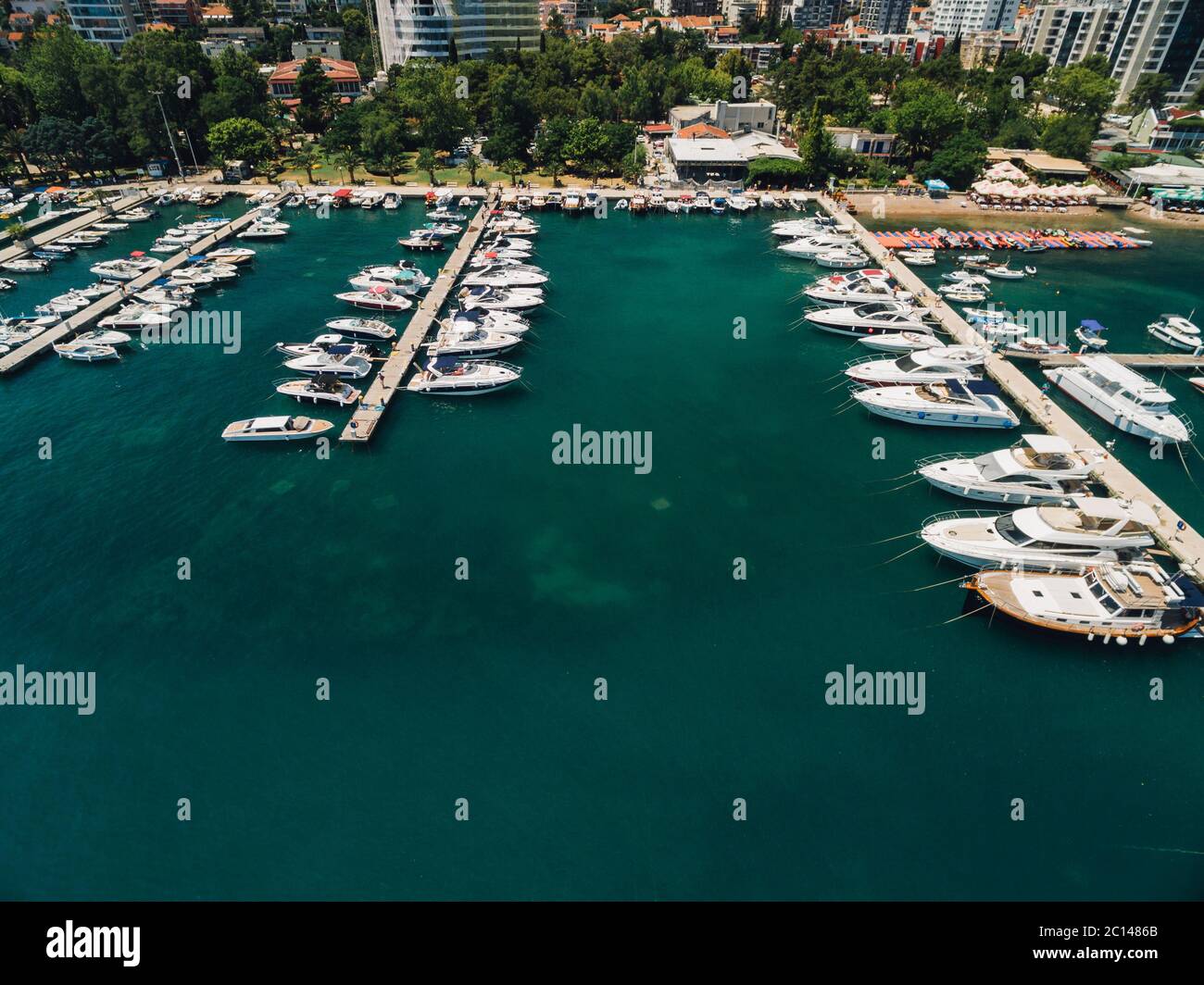 Boat dock and yacht port in Budva, Montenegro. Aerial photo from the ...
