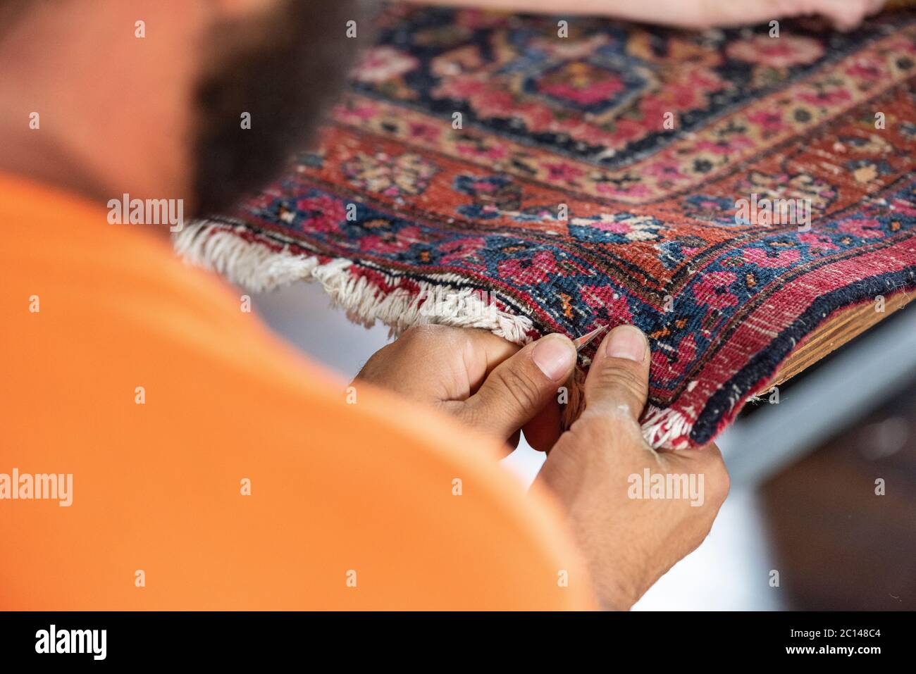 traditional hand sewing fixing old vintage antique persian carpet up ...