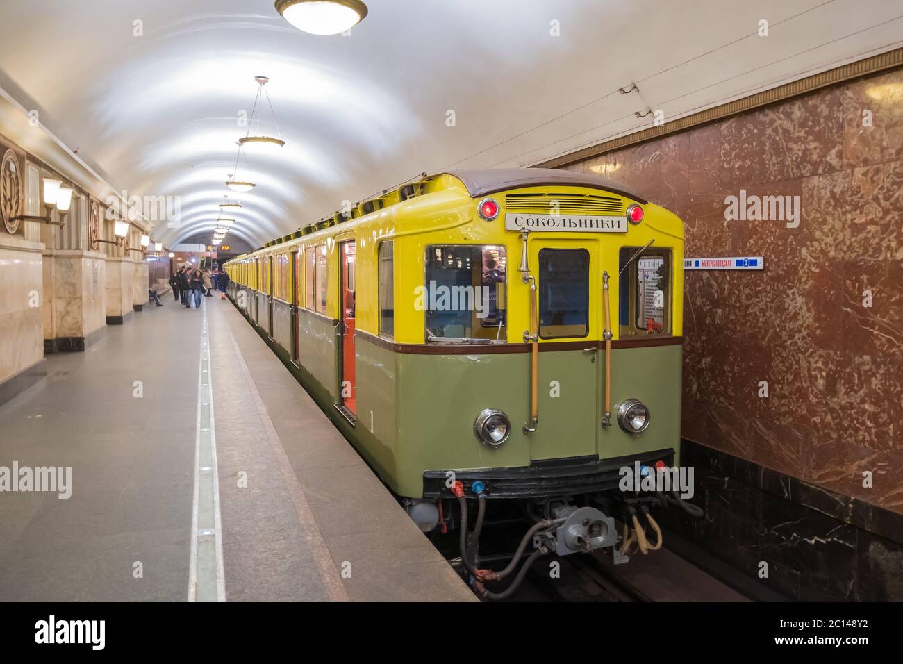 Retro train on subway station Stock Photo - Alamy