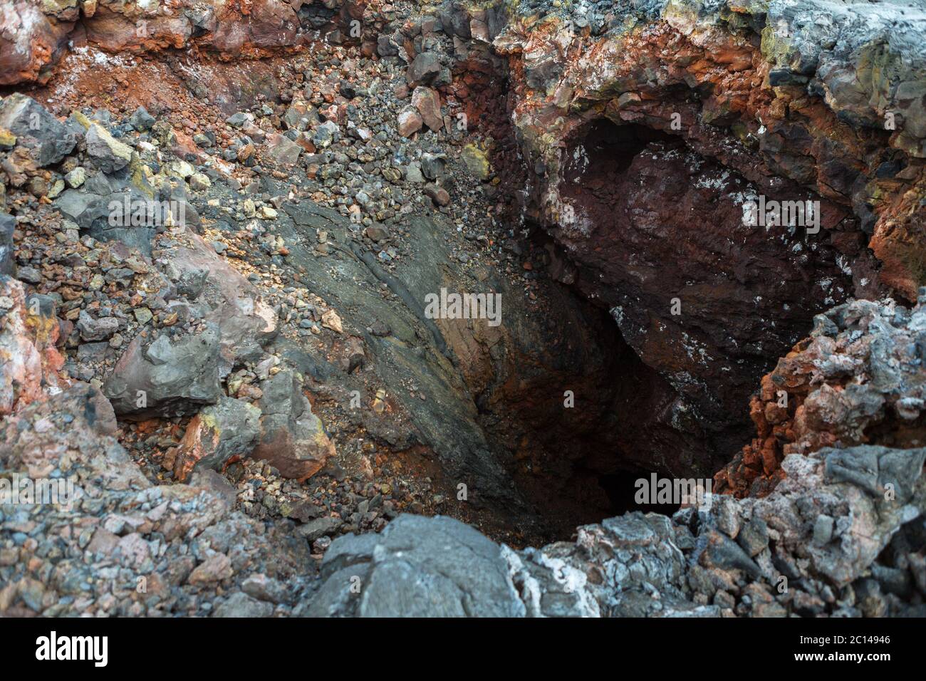 Cave in the lava field at Tolbachik volcano, after eruption in 2012 ...