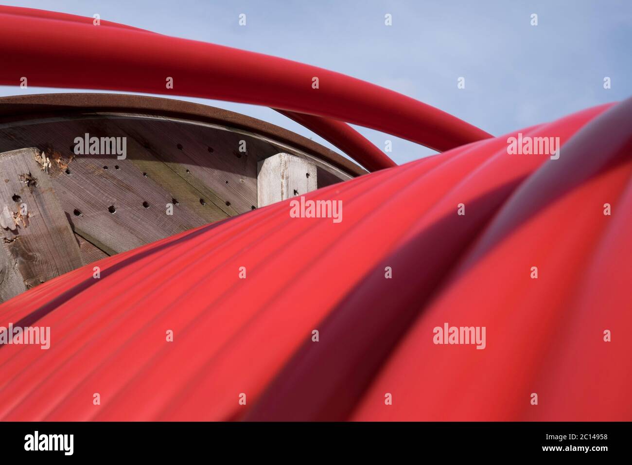 Wooden Coil of Red Electric Cable Outdoor Stock Photo - Alamy