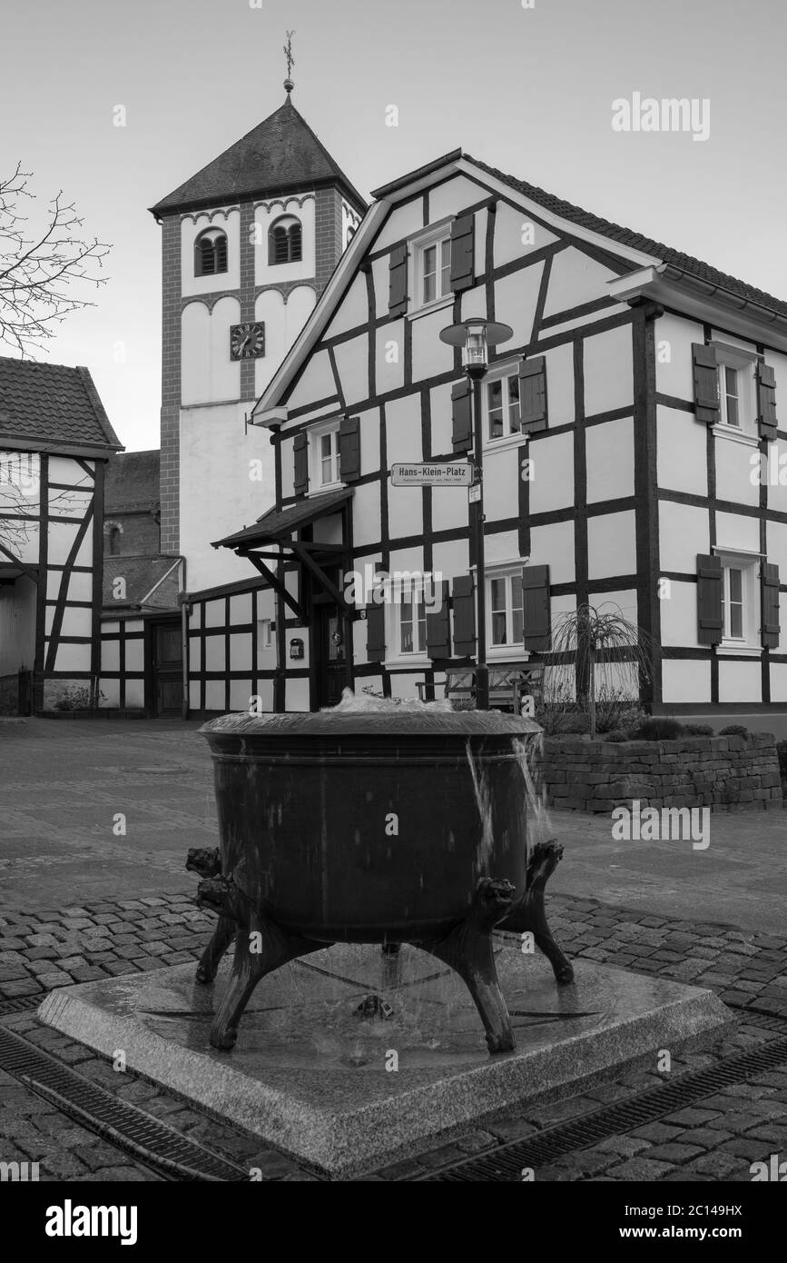 Center of village Odenthal with parish church and old buildings ...