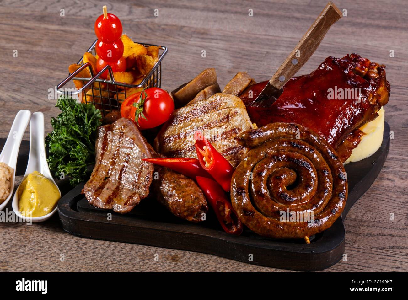 Grilled meat mix plate - beef, pork and chicken Stock Photo - Alamy