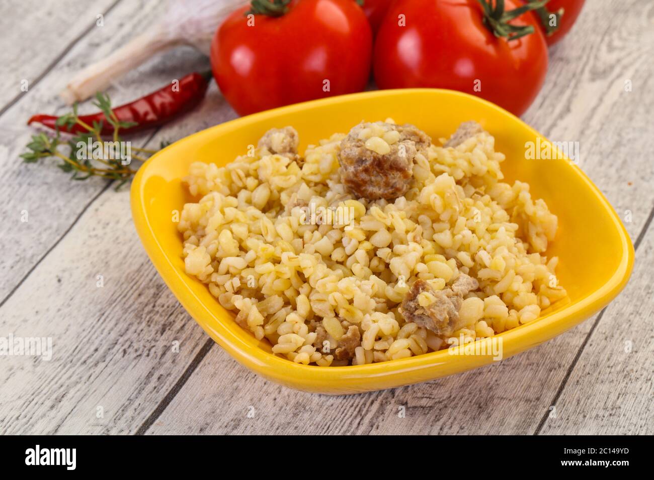 Bulgur with meat and spices Stock Photo - Alamy