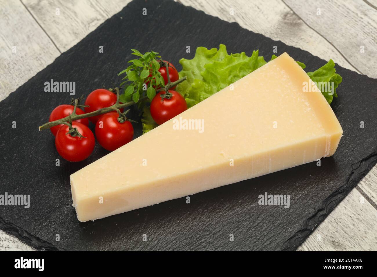 Italian traditional parmesan cheese triangle served salad Stock Photo ...