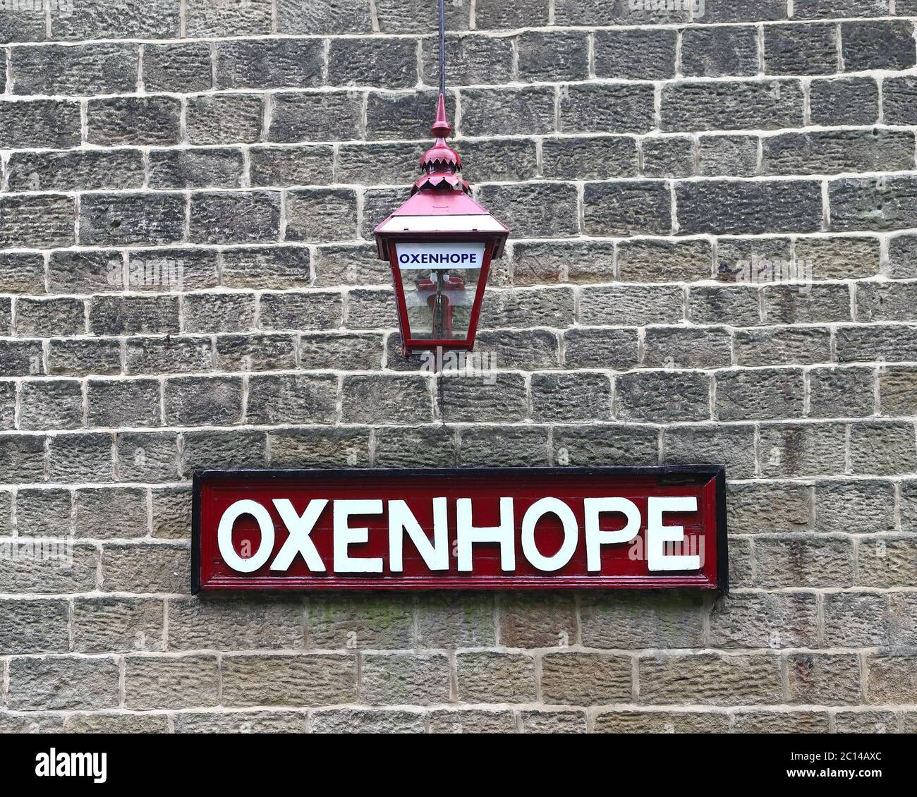 A destination sign and traditional lantern at Oxenhope Station on the ...