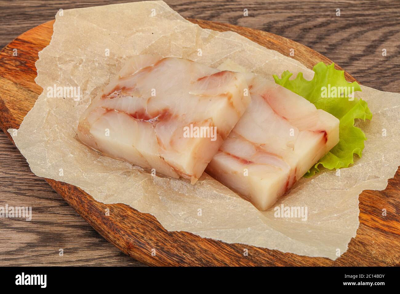 Raw dietary pollock fish fillet for cooking Stock Photo - Alamy