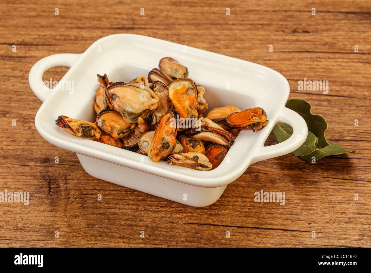 Pickled mussels with spices in the bowl Stock Photo - Alamy
