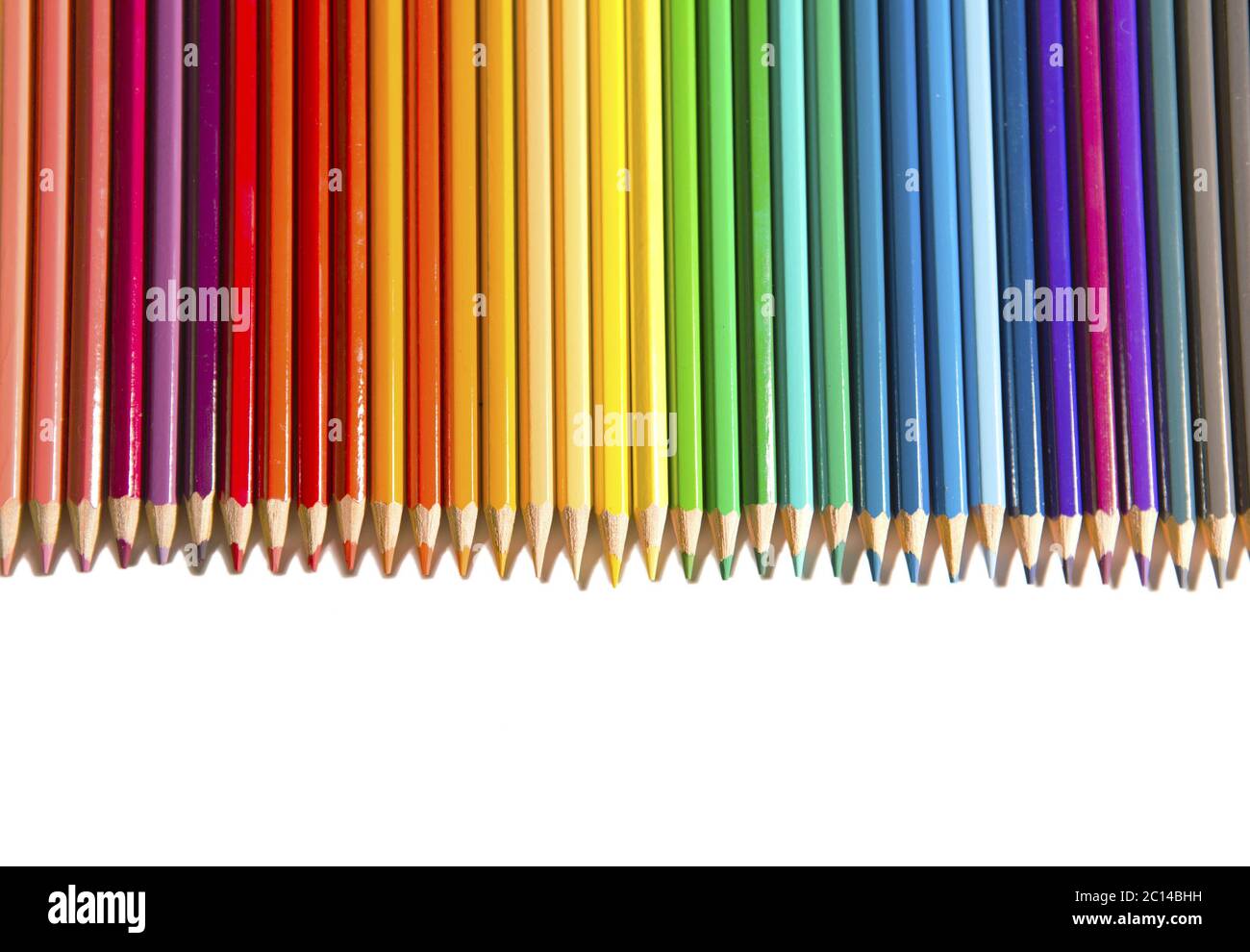 Color pencils in a row Stock Photo - Alamy