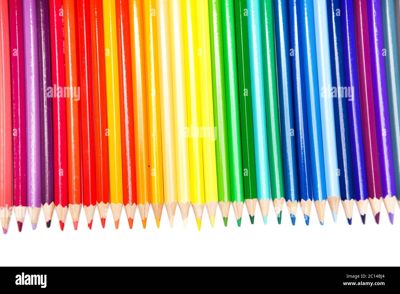 Color pencils in a row Stock Photo - Alamy