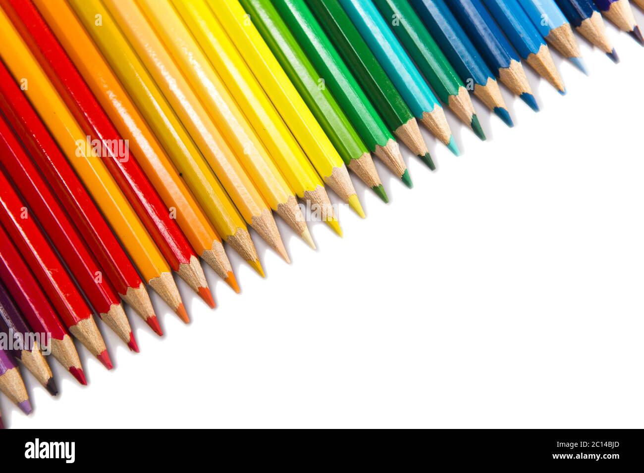 Color pencils in a row Stock Photo - Alamy