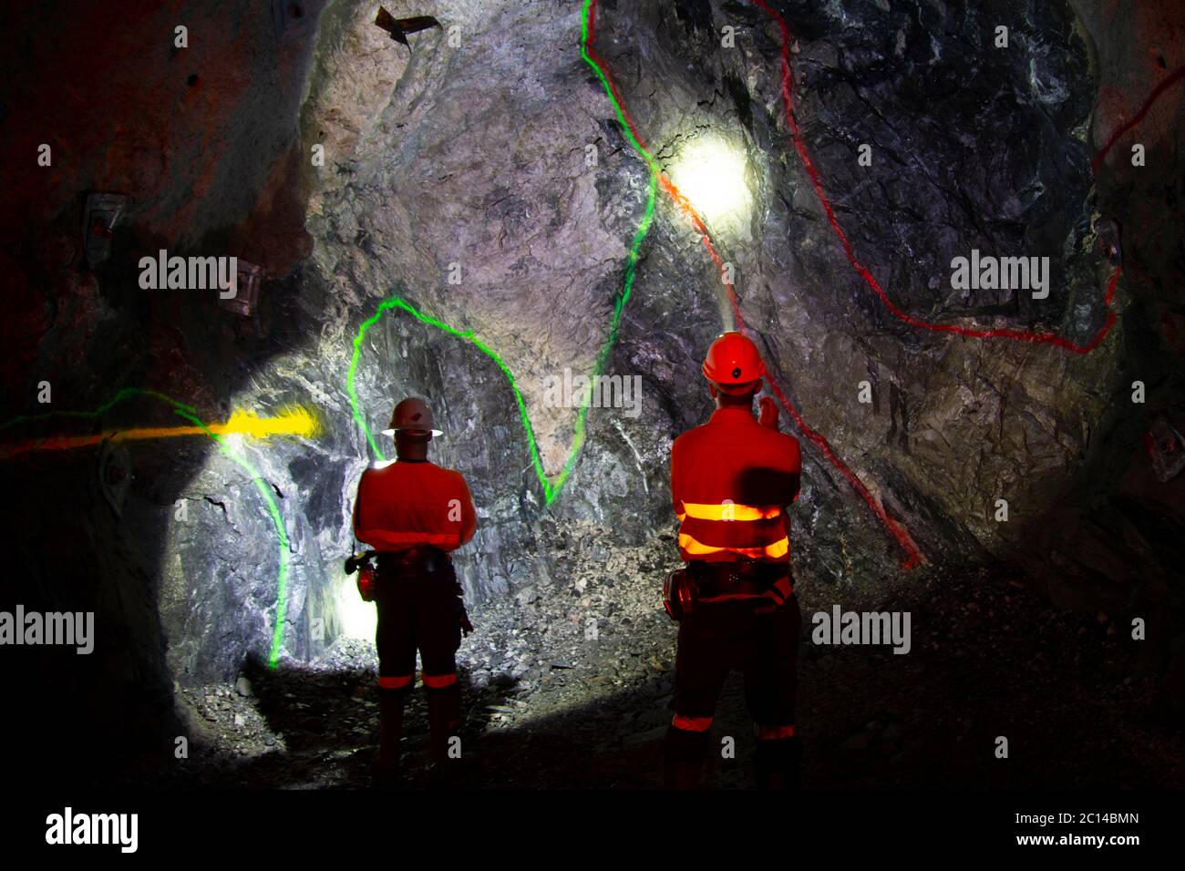 Underground Miners in Ore Tunnel Stock Photo - Alamy