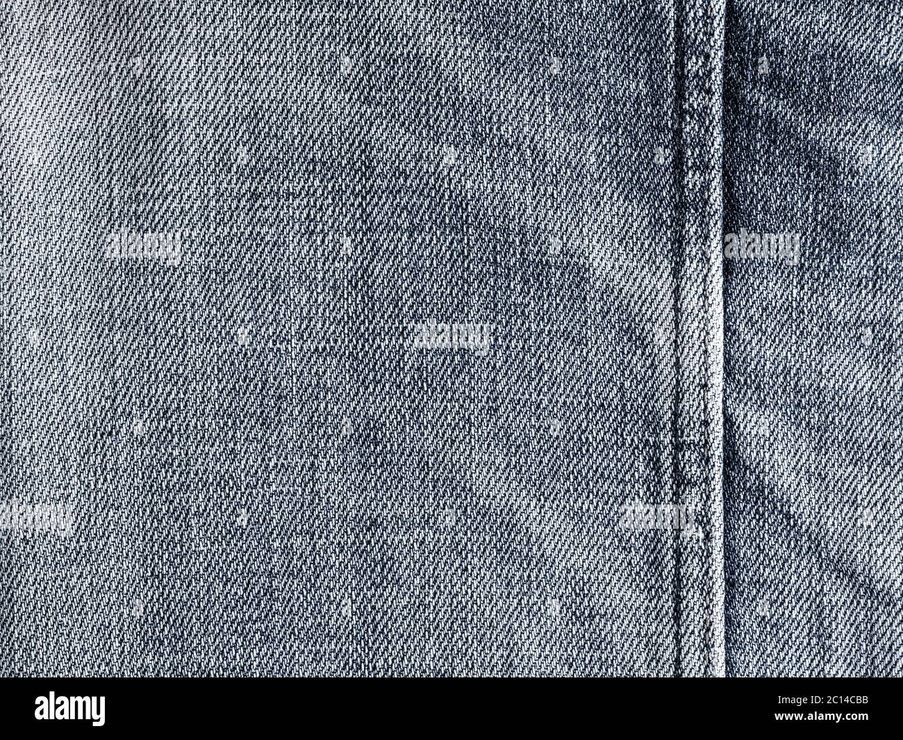 Texture and seam of denim fabric Stock Photo - Alamy