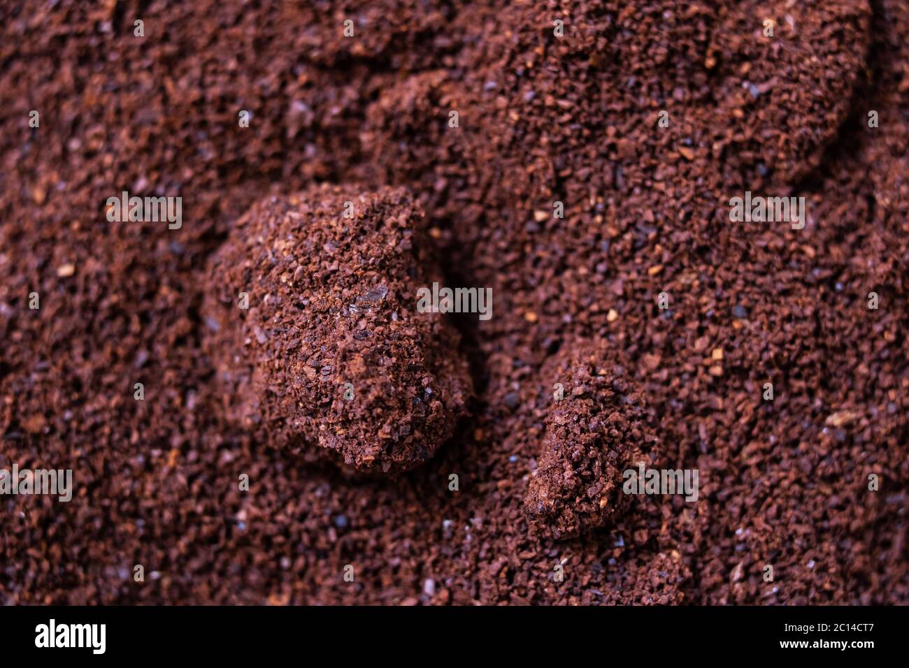 Natural ground coffee close up background or texture Stock Photo - Alamy