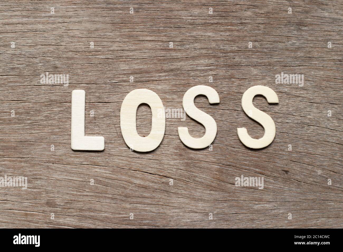 Alphabet letter in word loss on wood background Stock Photo - Alamy