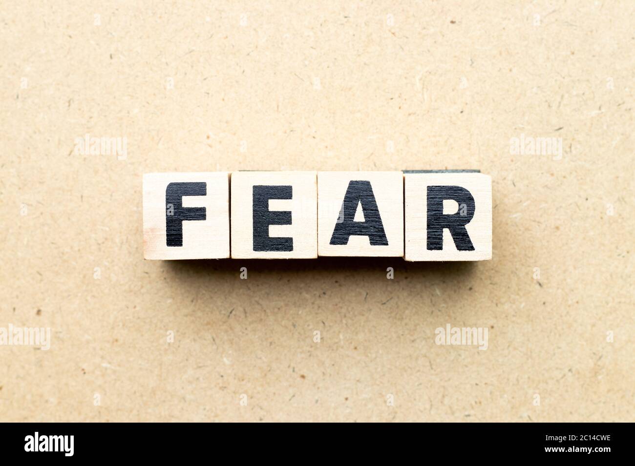 Letter block in word fear on wood background Stock Photo - Alamy