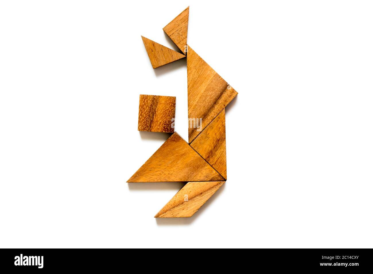 Wood tangram puzzle in dancing man shape on white background (Concept ...