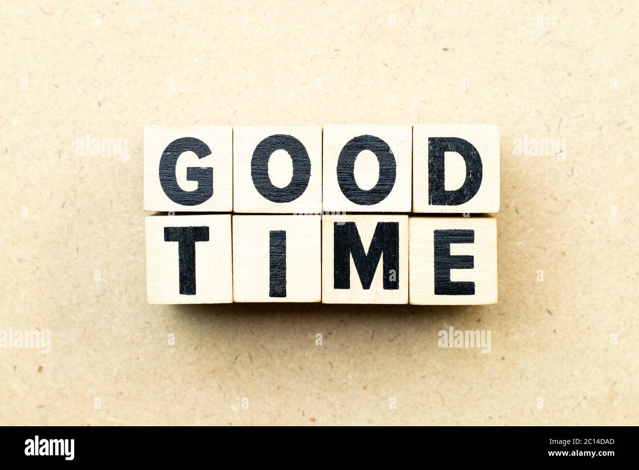 Letter block in word good time on wood background Stock Photo - Alamy