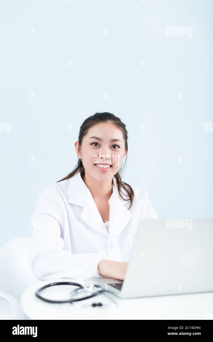 young pretty woman doctor in clinic Stock Photo - Alamy