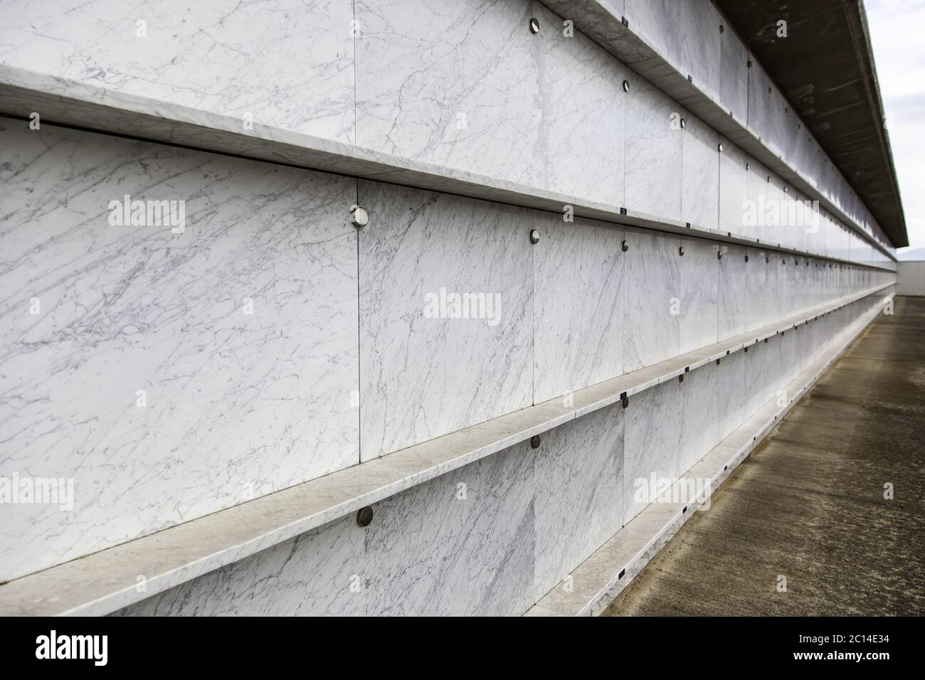 New and empty graves, new unused graveyard detail Stock Photo - Alamy