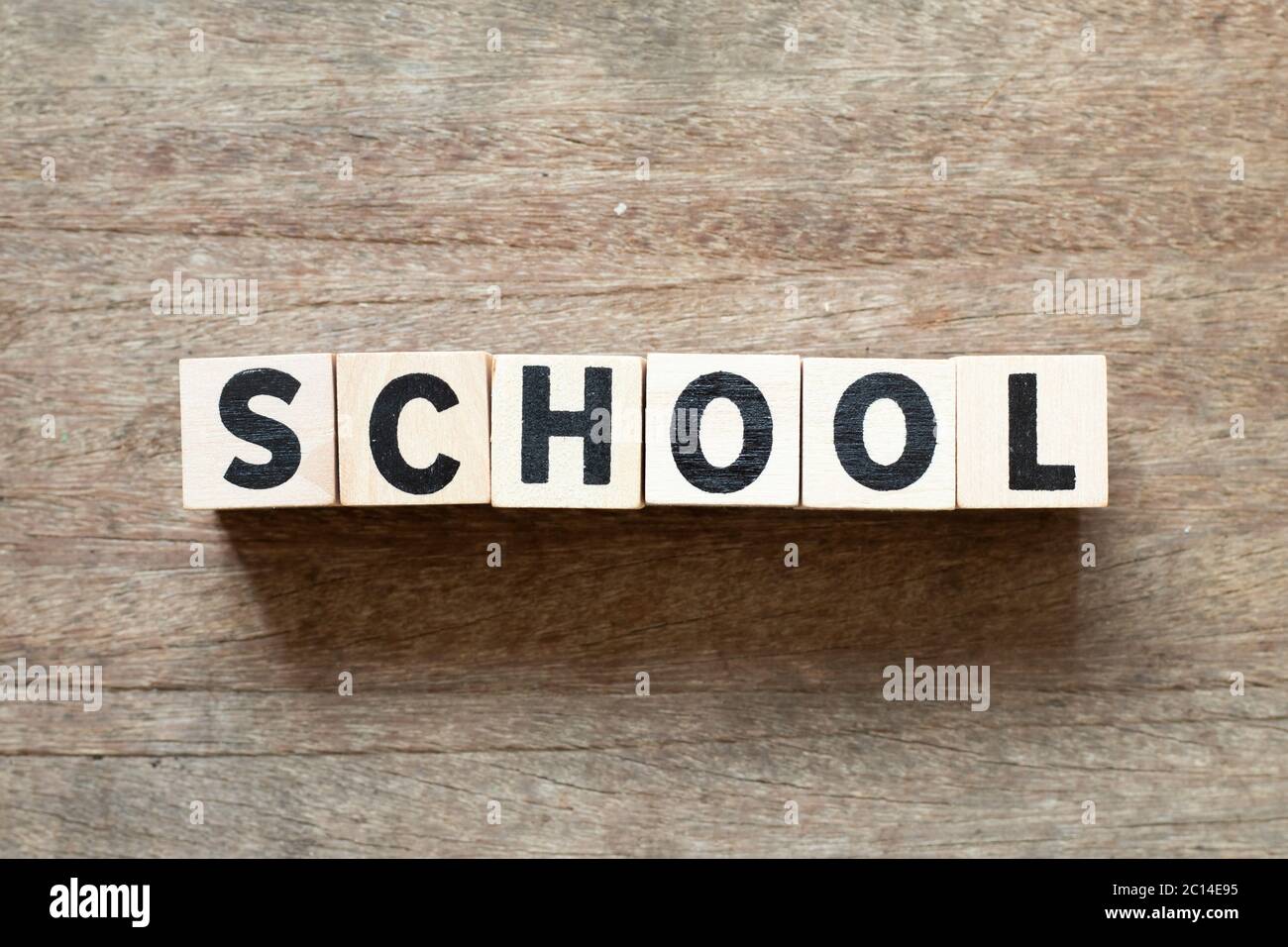 Letter block in word school on wood background Stock Photo - Alamy