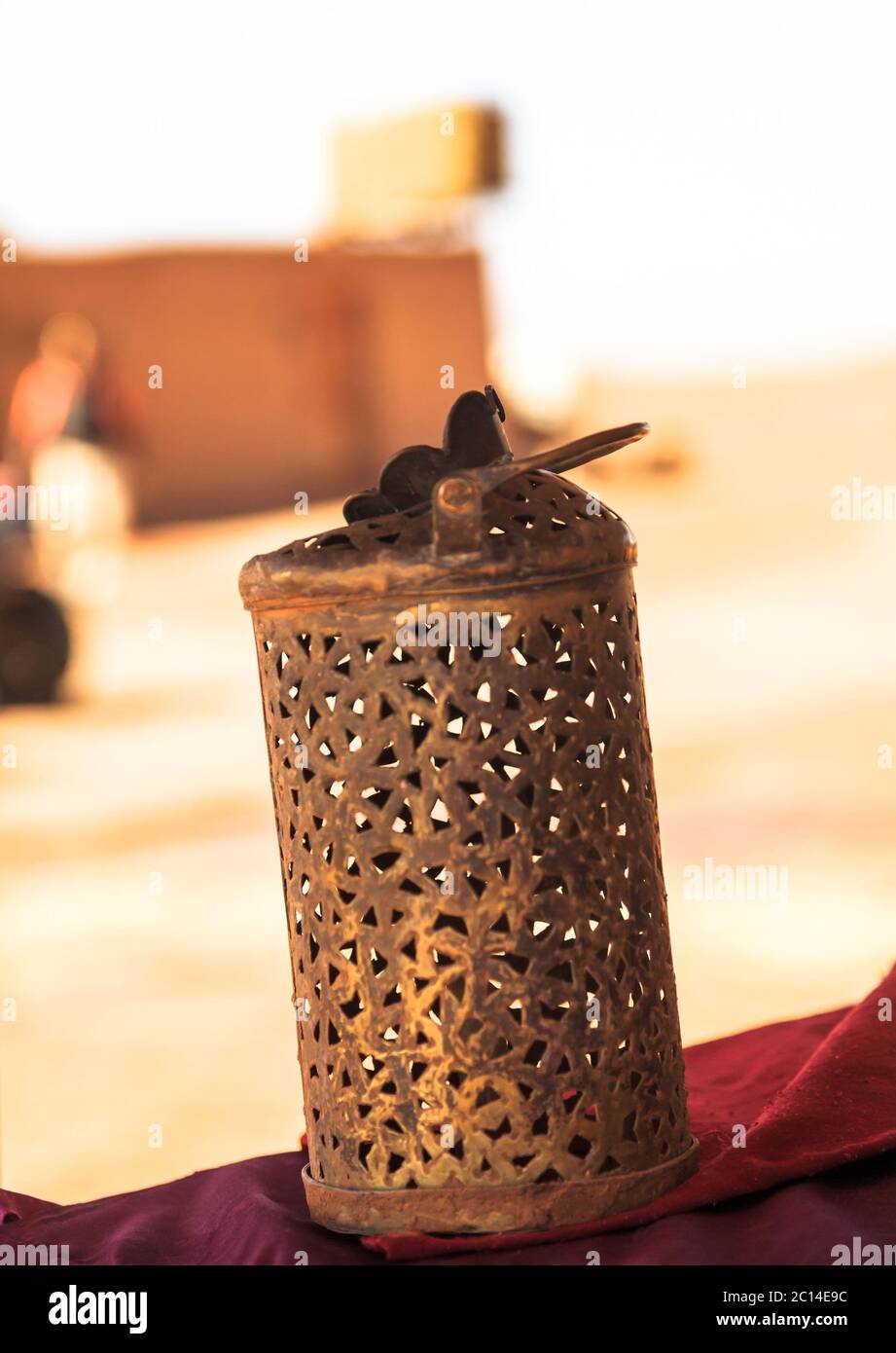 wrought iron berber lamp with traditional nomad tents on background ...