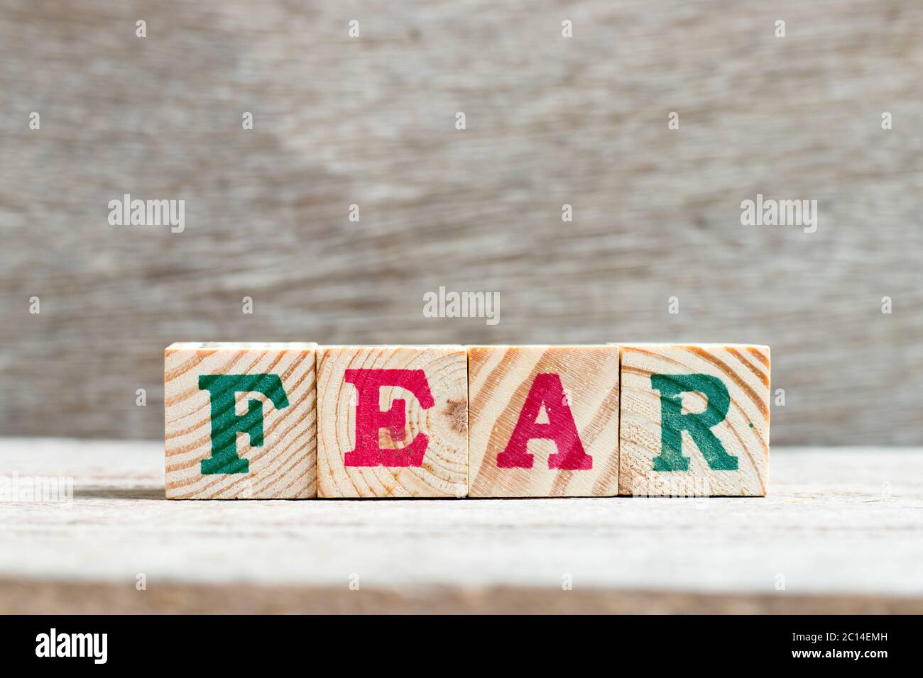 Letter block in word fear on wood background Stock Photo - Alamy