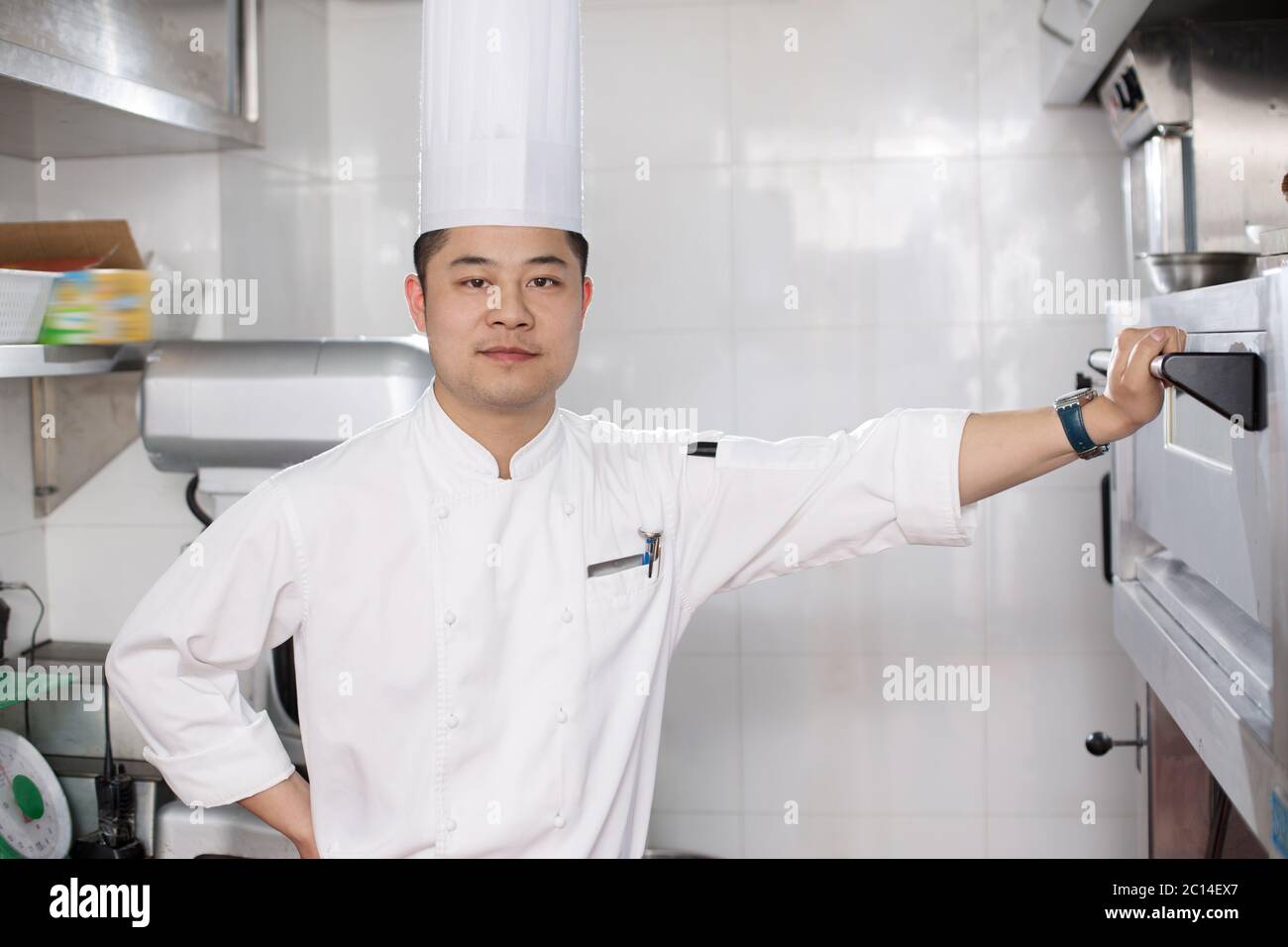 Chinese young man kitchen hi-res stock photography and images - Alamy