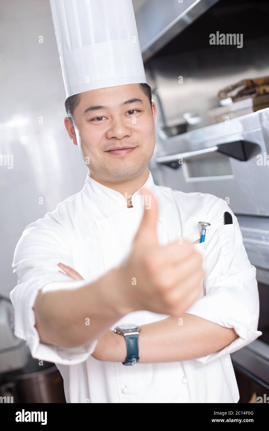 young man chelf in modern kitchen Stock Photo - Alamy