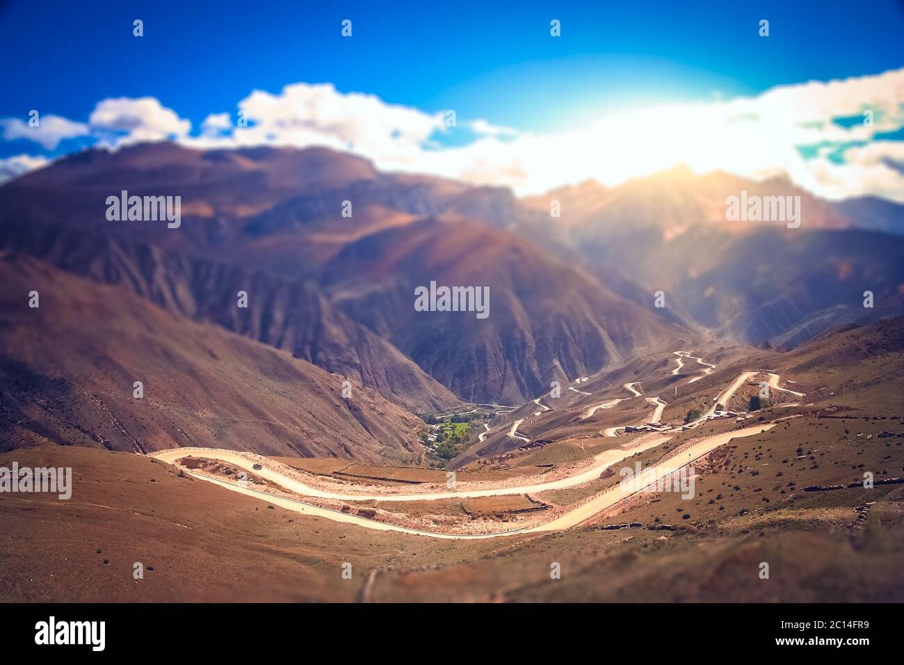 Twisting road to the top of a pass Stock Photo - Alamy