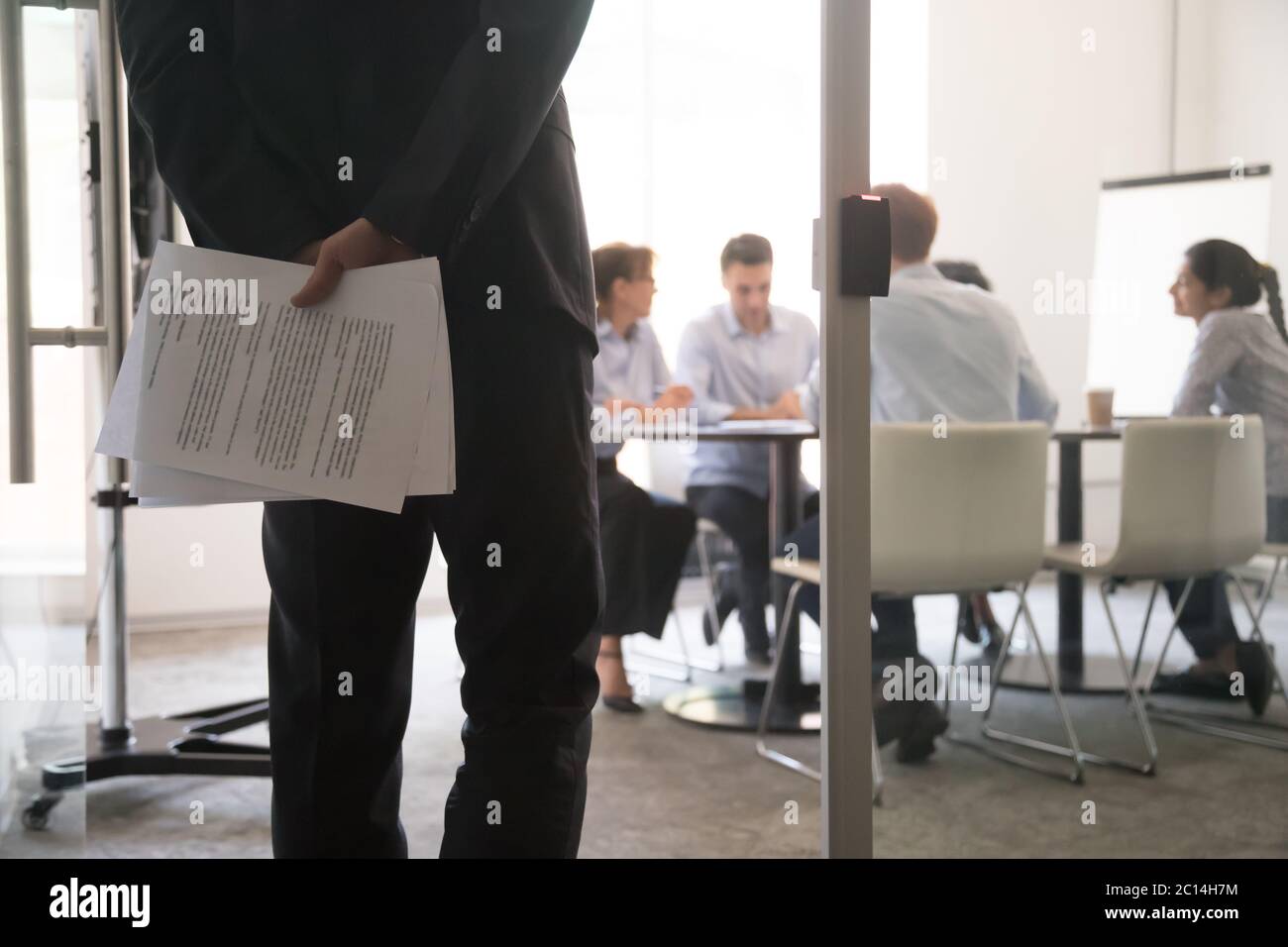 Employees holding documents, waiting, feeling nervous before ...