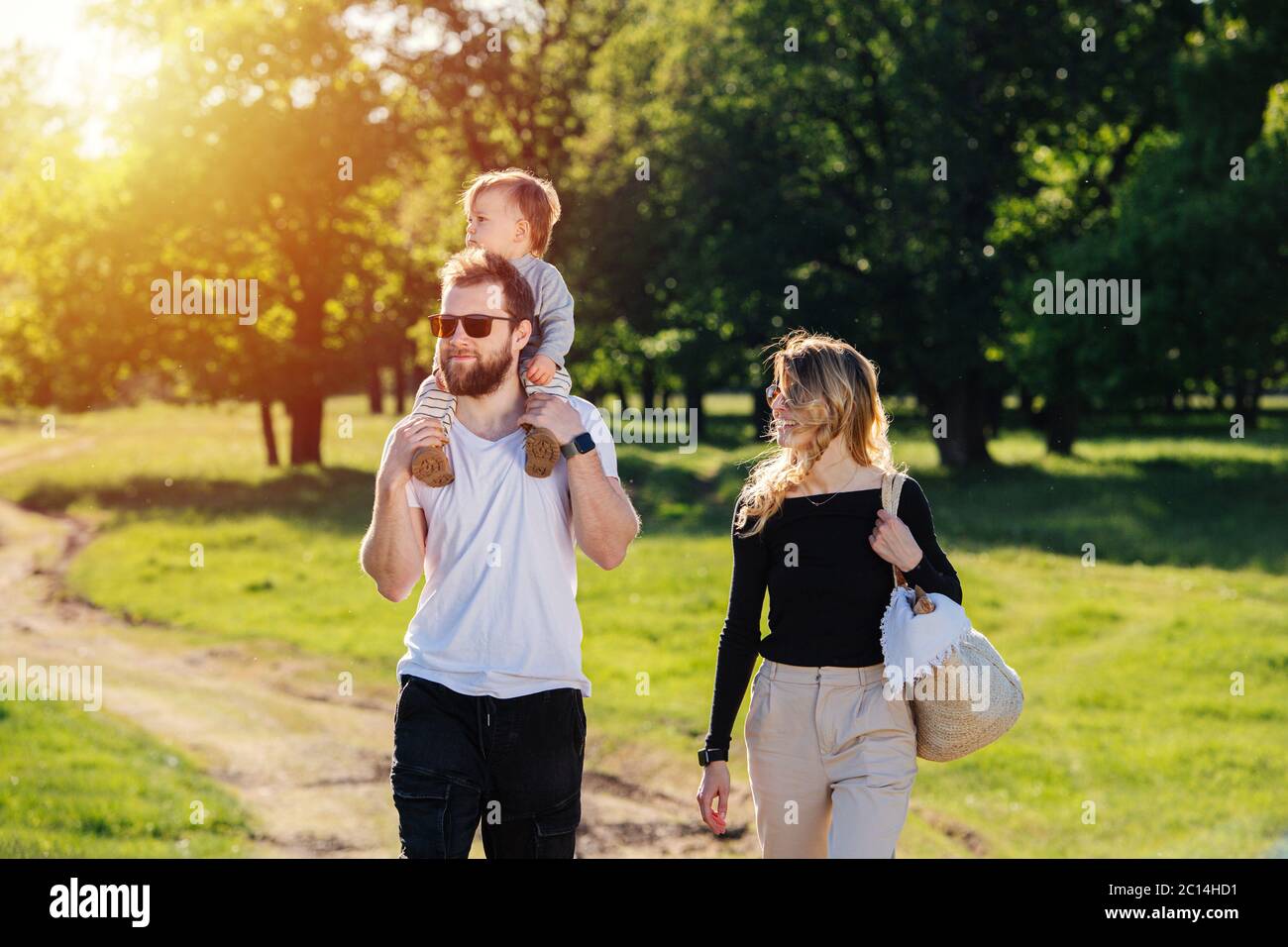 People walking slowly along track enjoying nature surrounding them ...