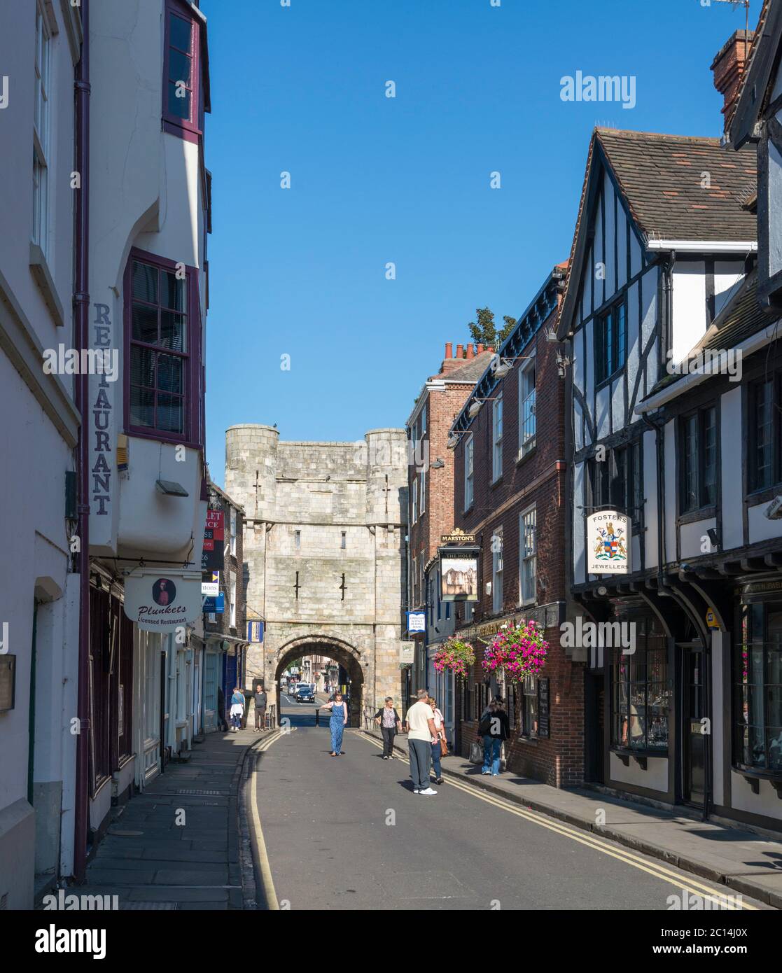 A sunny Summer view looking along High Petergate towards Bootham Bar in ...