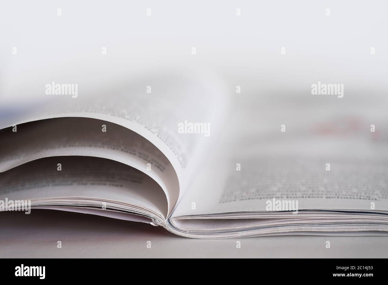 Open newspaper on table hi-res stock photography and images - Alamy
