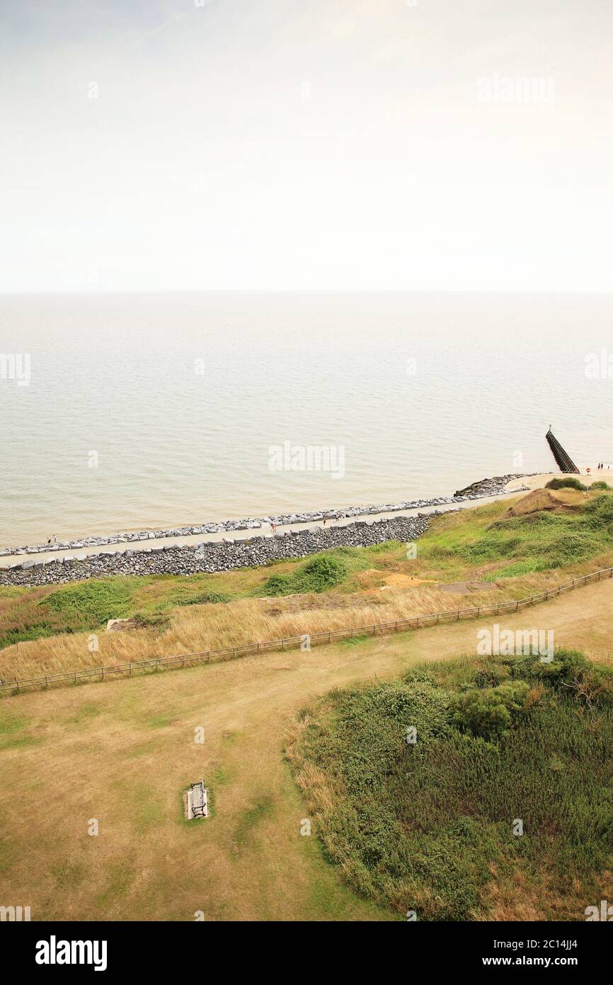 landscape image from above looking down at the sea and grass below at ...