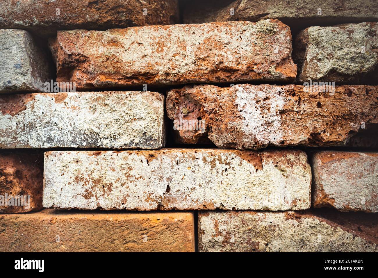 Pattern of decorative natural stone wall with stones in several colors ...