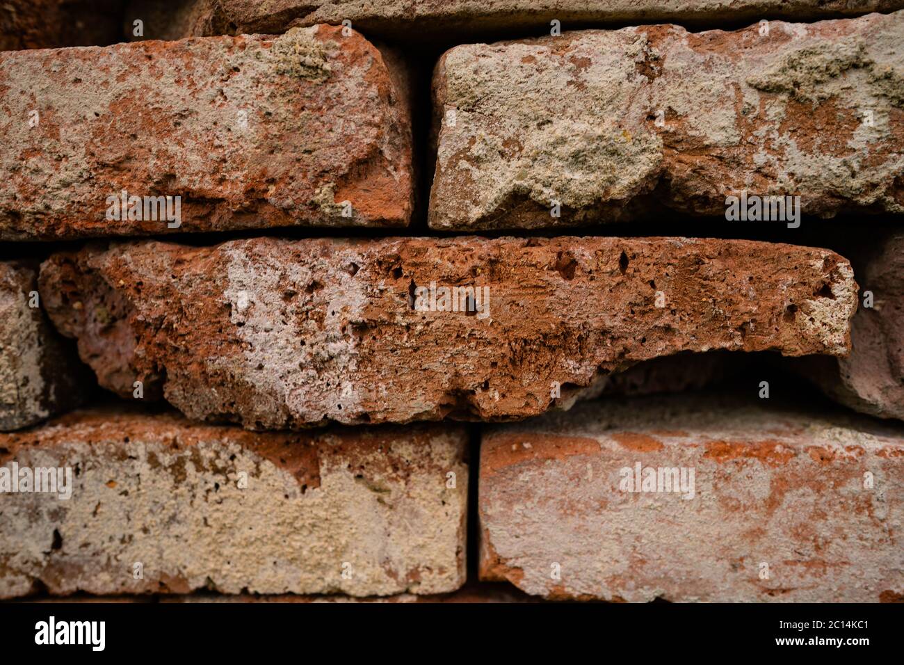 Pattern of decorative natural stone wall with stones in several colors ...