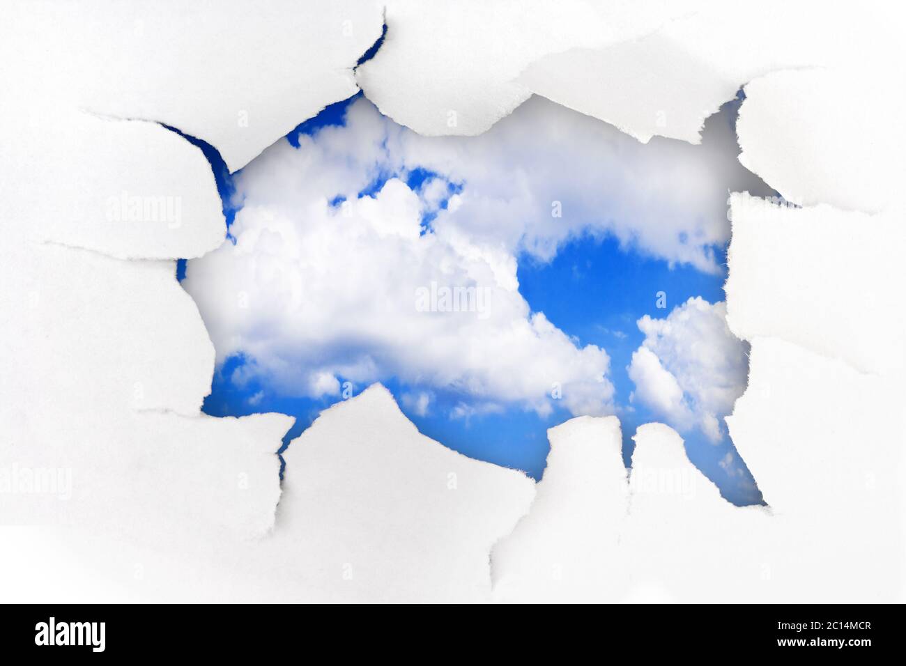 Paper hole and sky Stock Photo - Alamy
