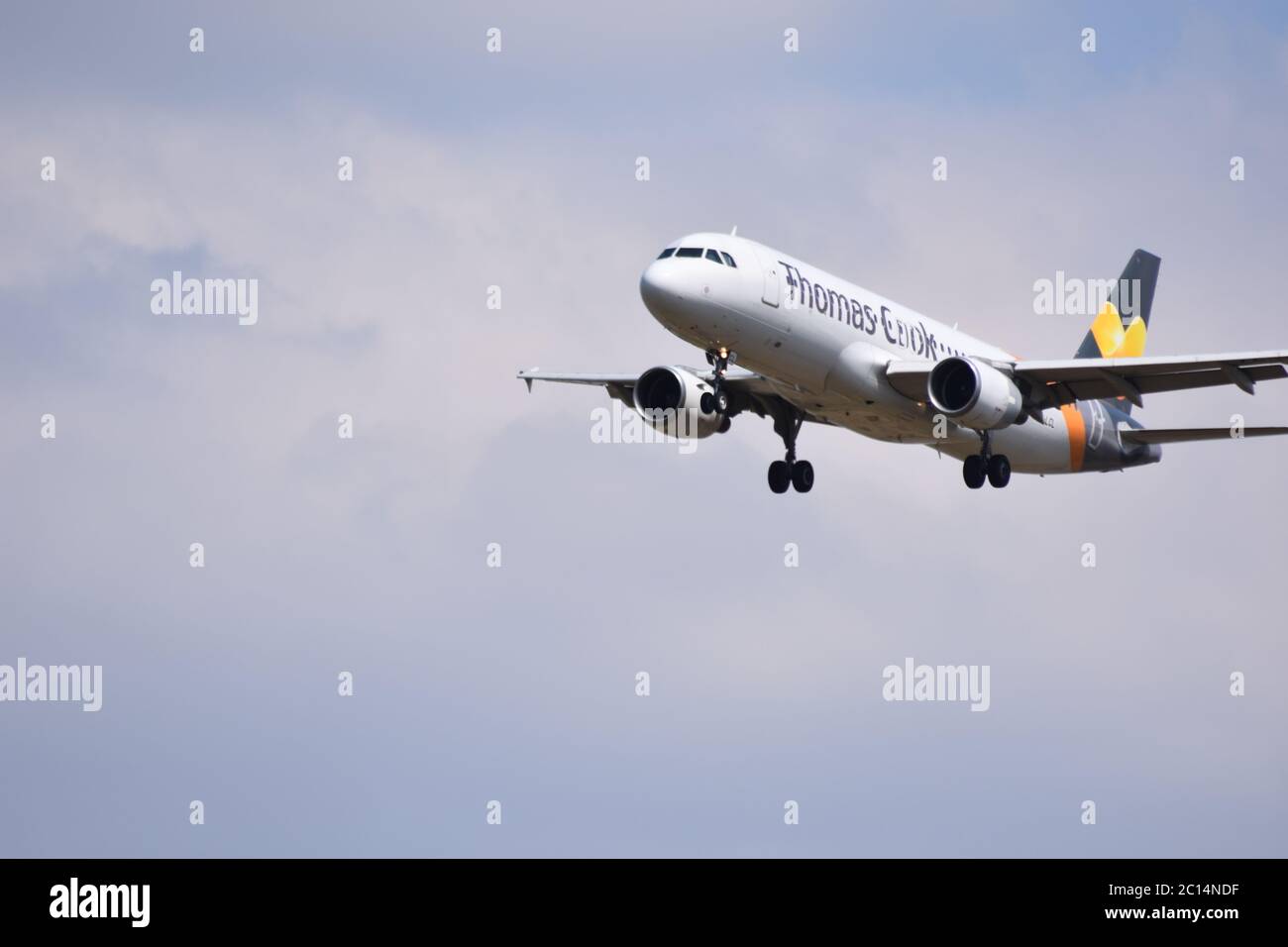 Thomas cook passenger plane in the sky hi-res stock photography and ...
