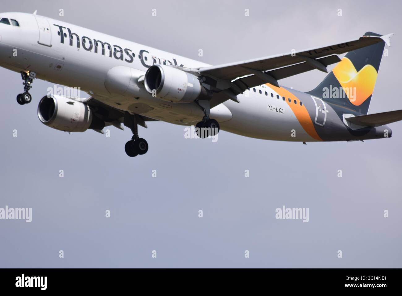 Thomas cook passenger plane in the sky hi-res stock photography and ...