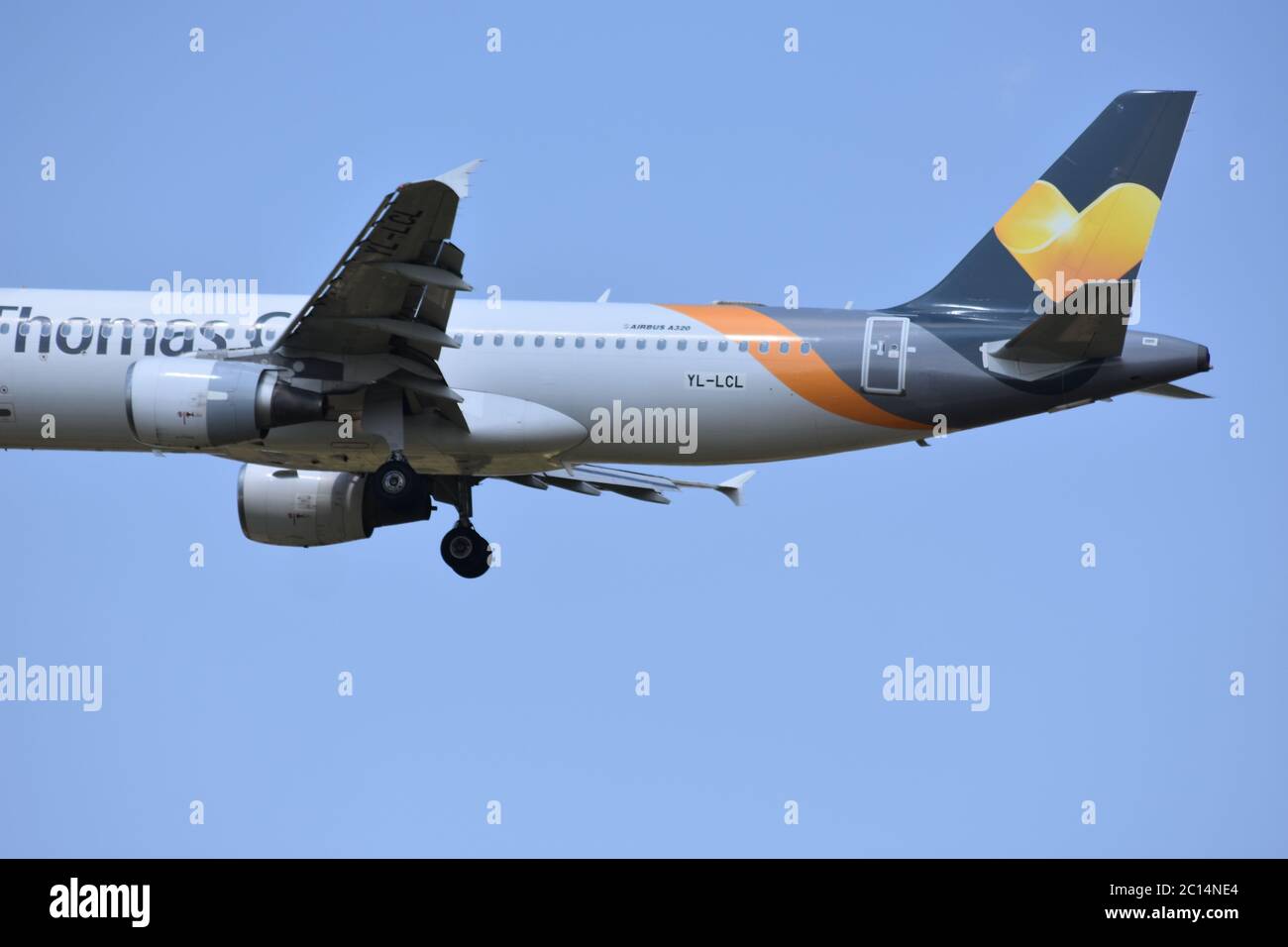 Thomas cook passenger plane in the sky hi-res stock photography and ...