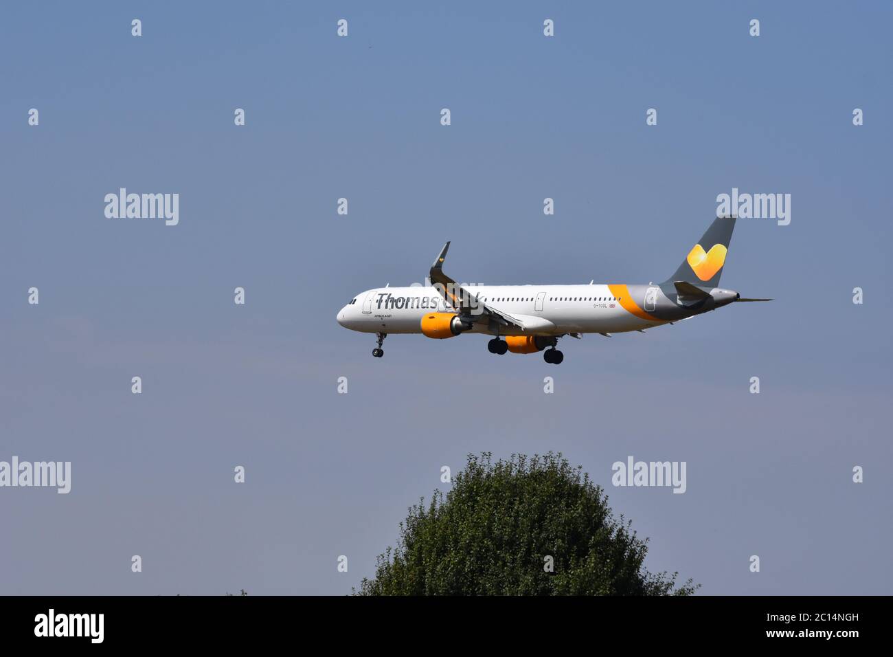 Thomas cook passenger plane in the sky hi-res stock photography and ...
