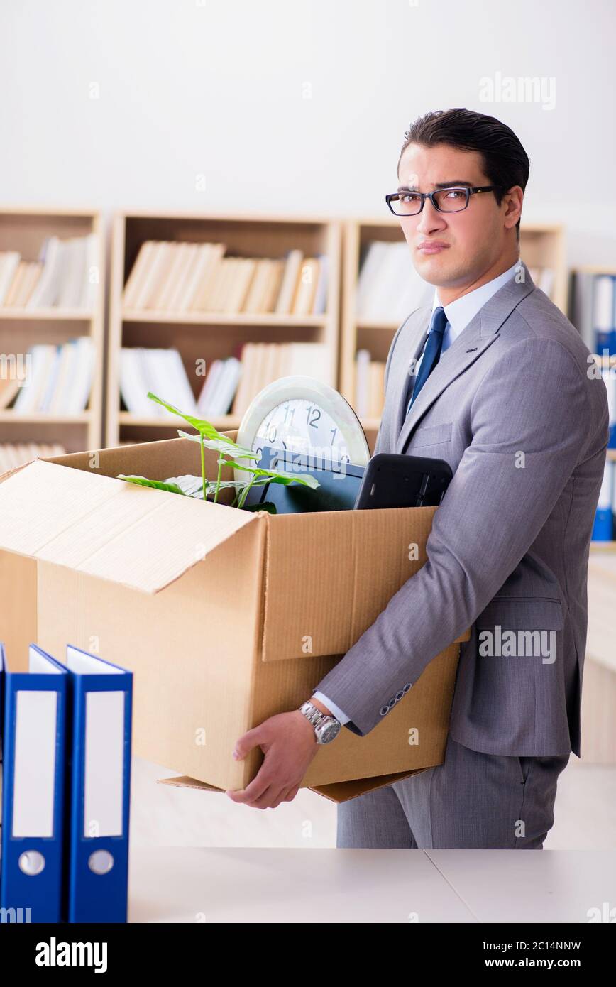 Man moving office with box and his belongings Stock Photo - Alamy