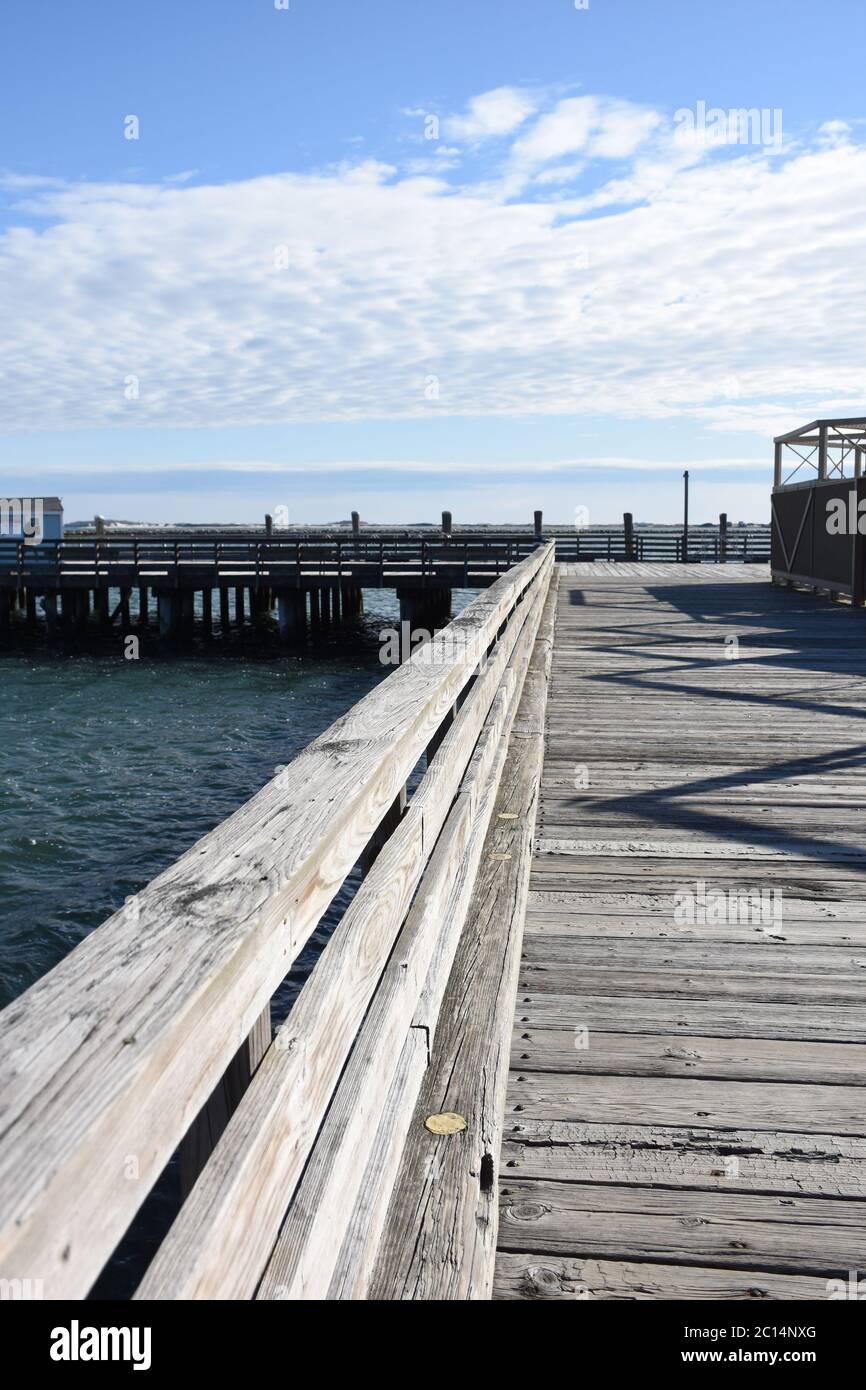 Weathered wood docks in Plymouth harbor on the ocean Stock Photo - Alamy