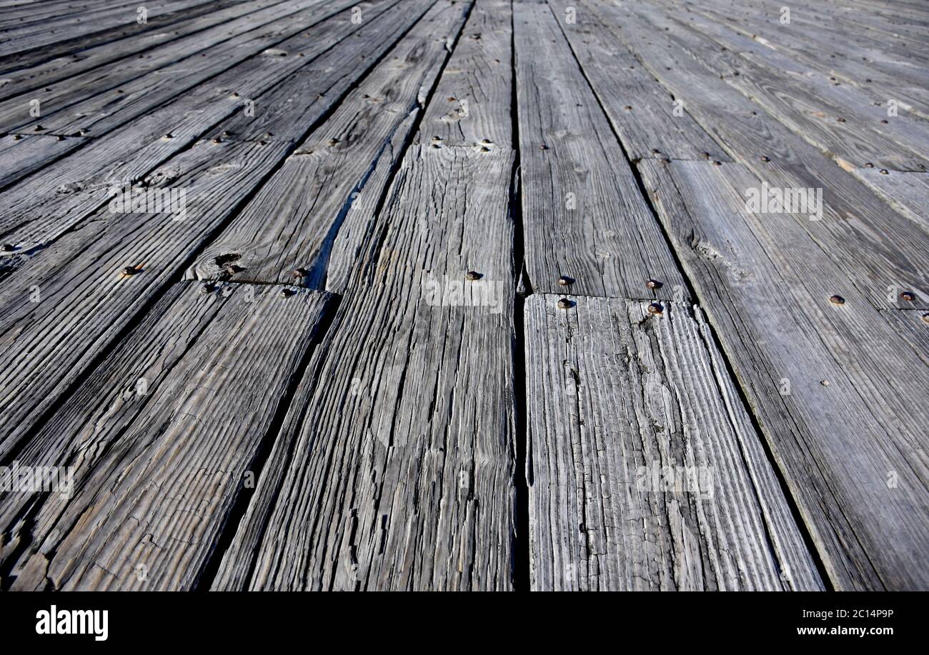 Worn weathered planks of old wood on a dock Stock Photo - Alamy