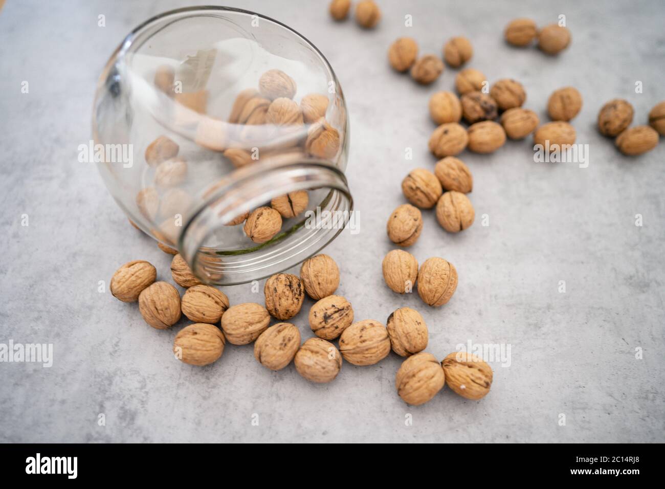 Concept healthy walnut kernels in a glass bowl. Good carbohydrate to ...