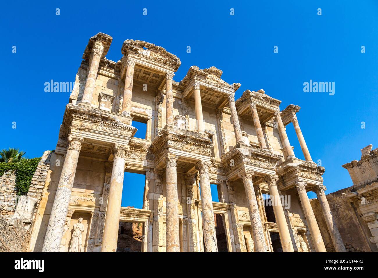 Ruins of Celsius Library in ancient city Ephesus, Turkey in a beautiful ...