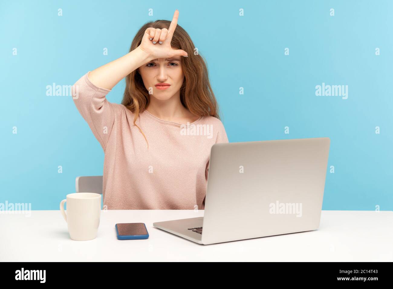 Lost job, unemployment. Depressed young woman employee sitting at ...