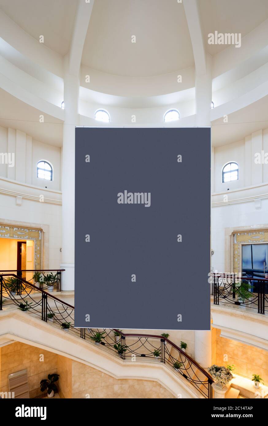 empty poster hanging in modern hall Stock Photo - Alamy