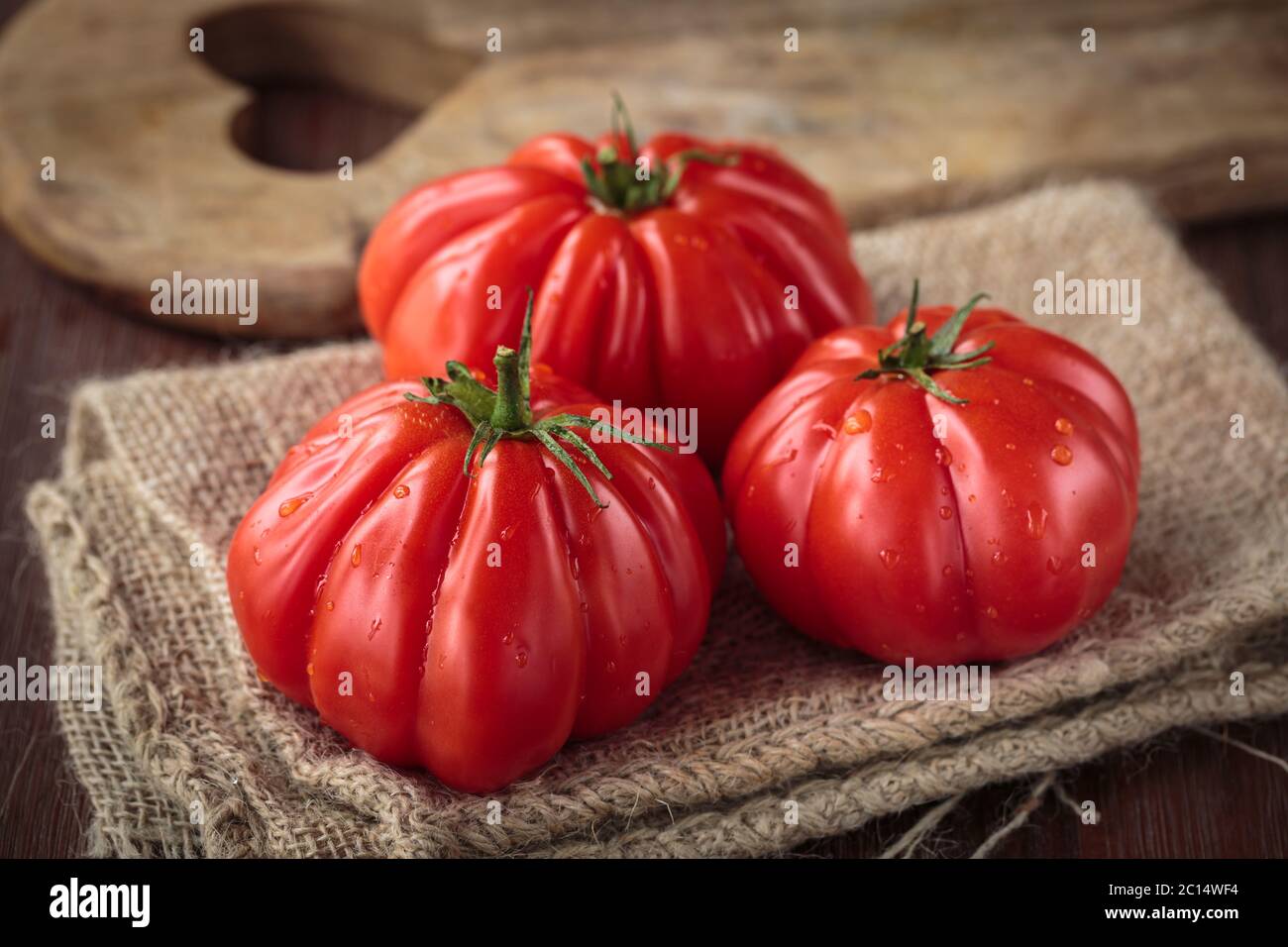 Fresh raw tomatoes Stock Photo - Alamy